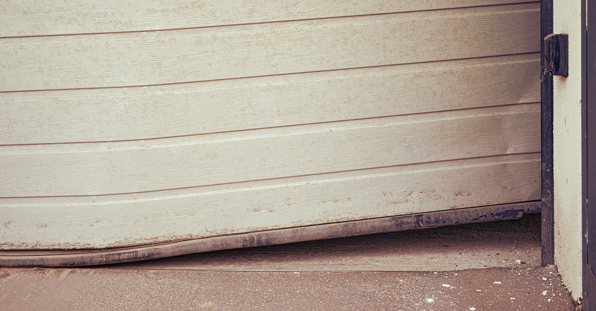 Garage Door Damage: Common Causes and Prevention